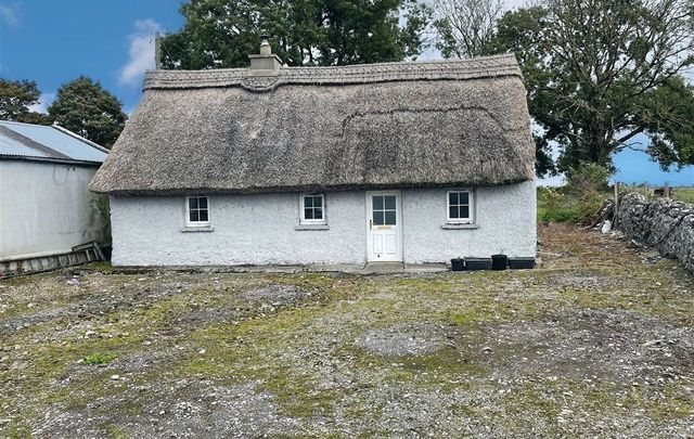 Traditional Irish thatched cottage on the market for $79k