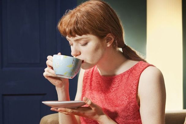 Proper Lady Drinking Tea