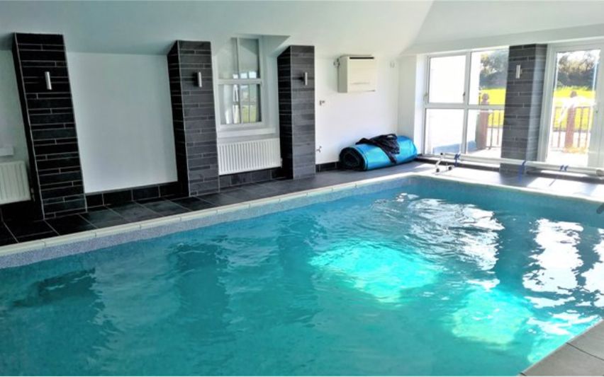 Irish thatched cottage with swimming pool for sale