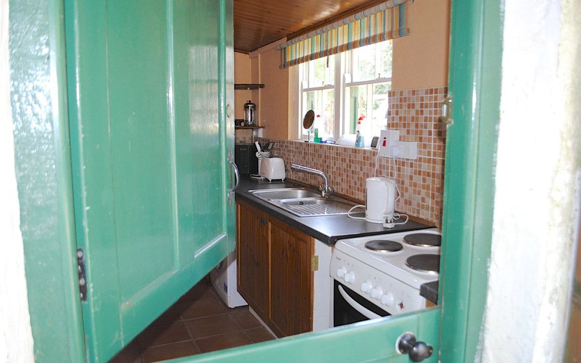 Traditional thatched cottage for $192k with open hearth