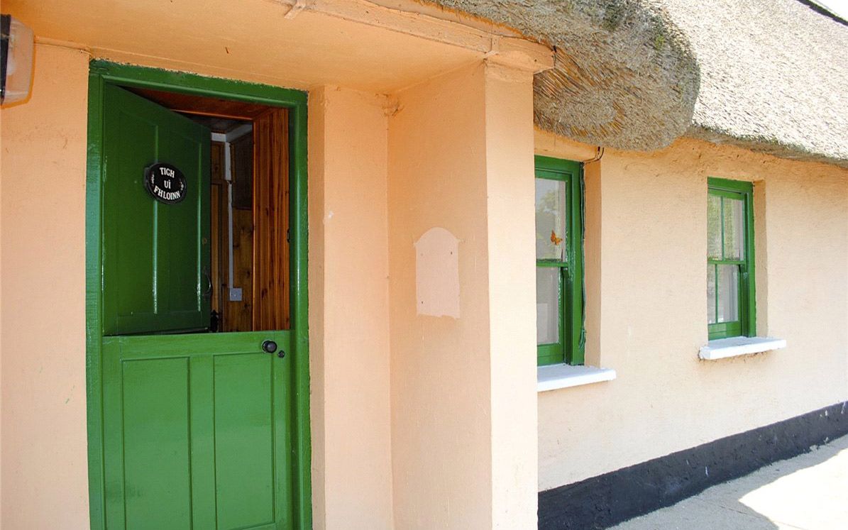 Traditional thatched cottage for $192k with open hearth